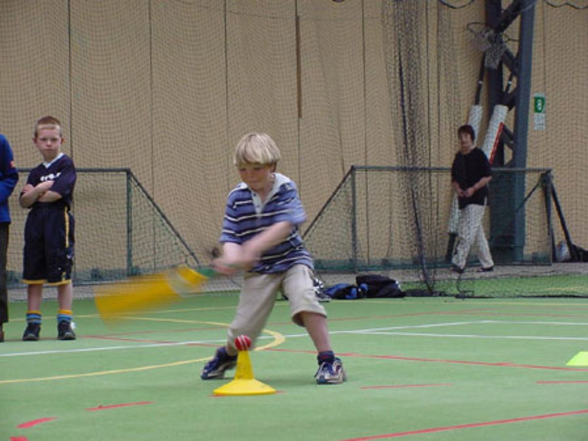 A young boy about to hit the ball during a North Otago MILO cricket ...