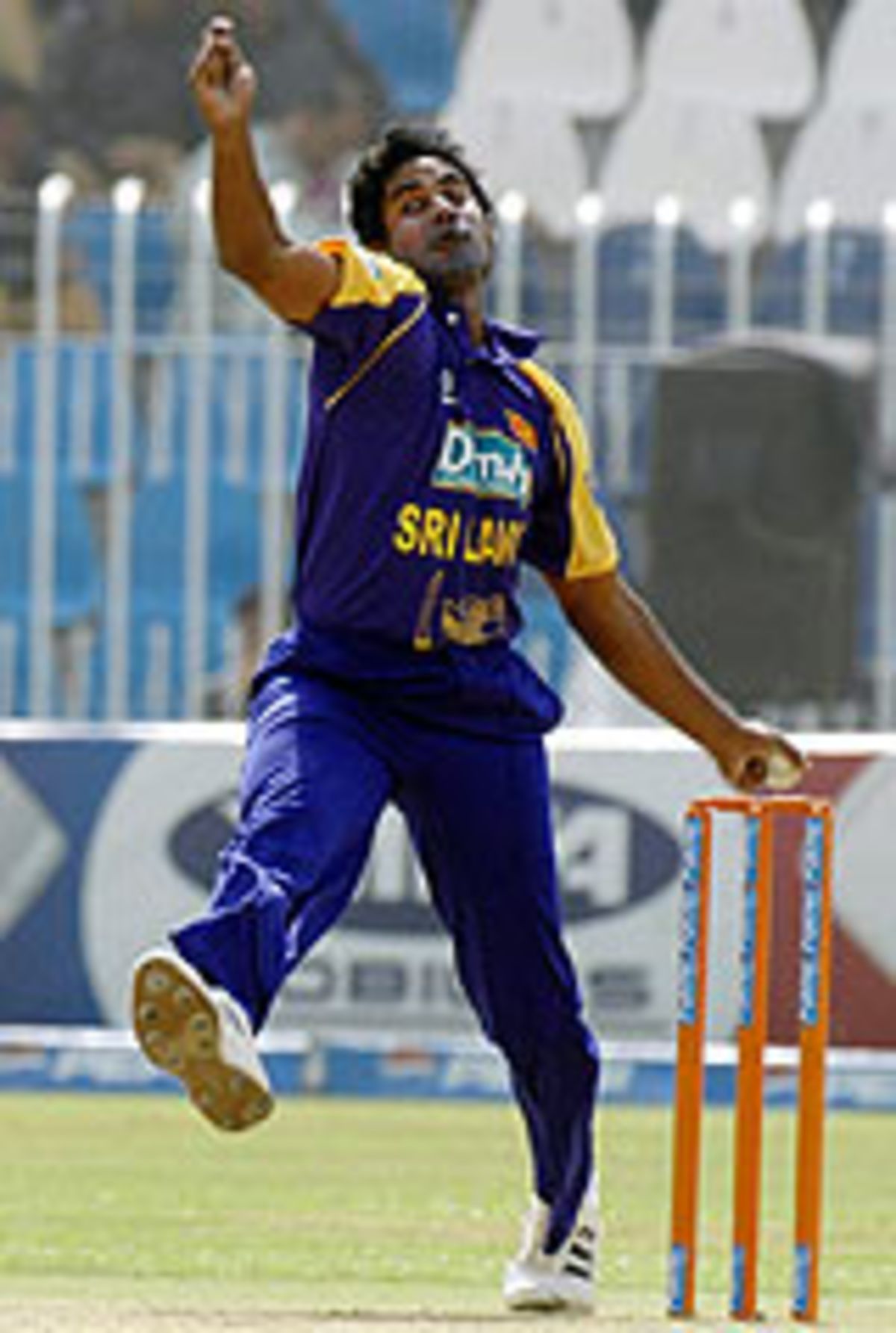 Chaminda Vaas bowls a delivery | ESPNcricinfo.com