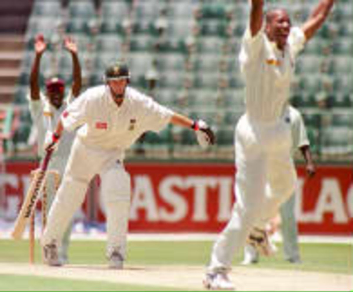 Curtley Ambrose ducks a Pollock bouncer | ESPNcricinfo.com