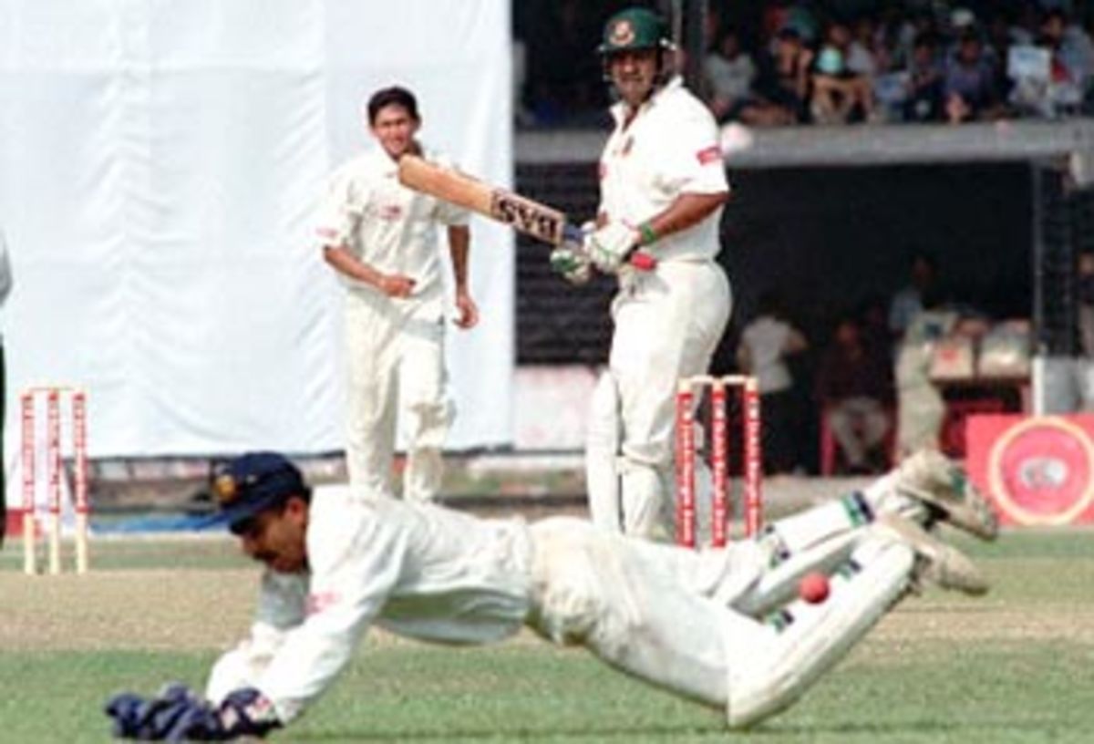 Indian wicket keeper Saba Karim dives to his left to collect the ball off Agarkar | ESPNcricinfo.com