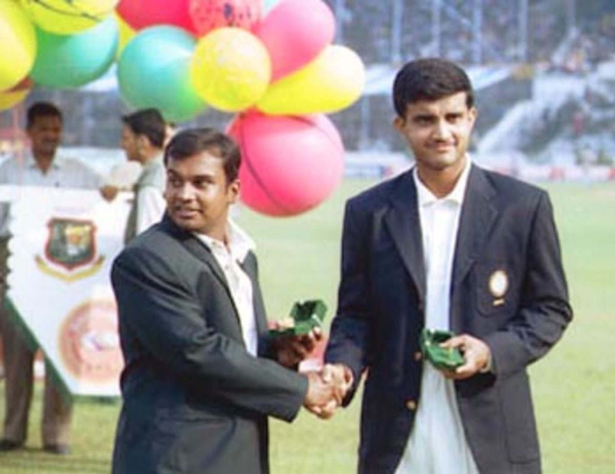 Bangladesh captain Naimur Rahman congratulates his Indian counterpart ... Bangladesh captain Naimur Rahman congratulates his Indian counterpart ...