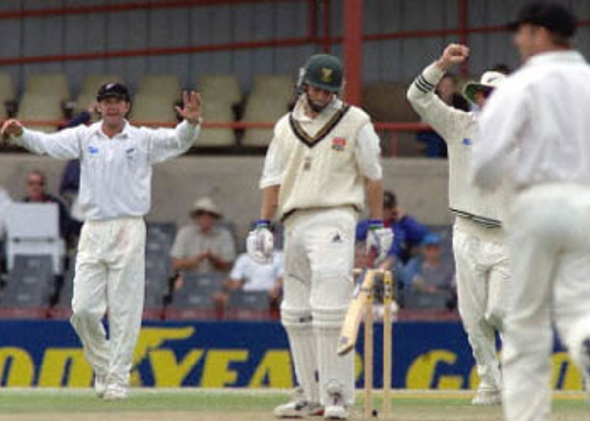 New Zealanders celebrate the fall of Neil Mckenzie | ESPNcricinfo.com