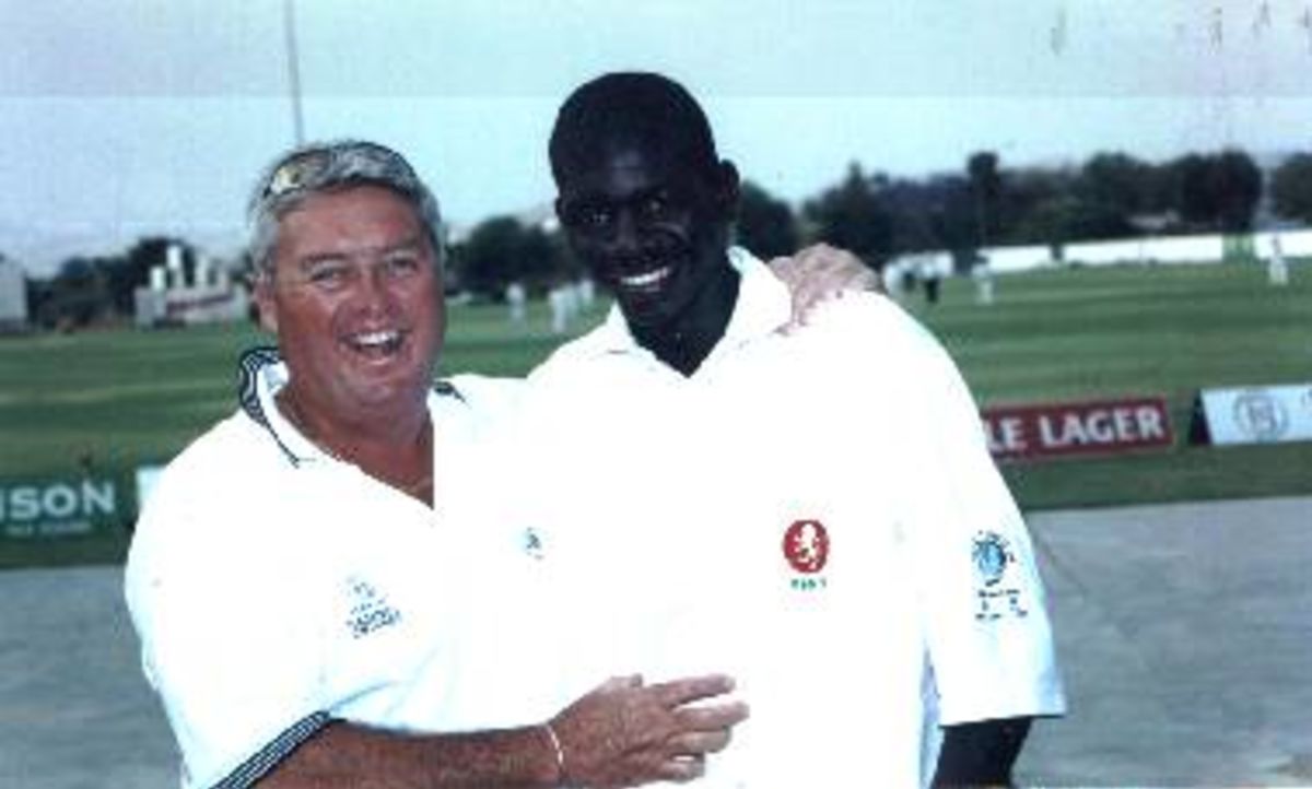 Bob Woolmer with Pollycarpus Negongo | ESPNcricinfo.com