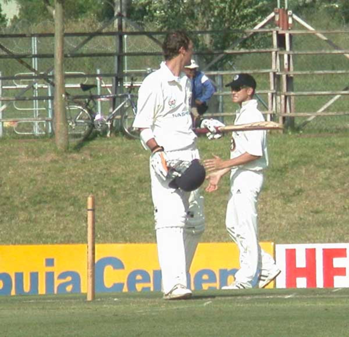 WP opening batsman Andrew Puttick drives a ball through the covers ...