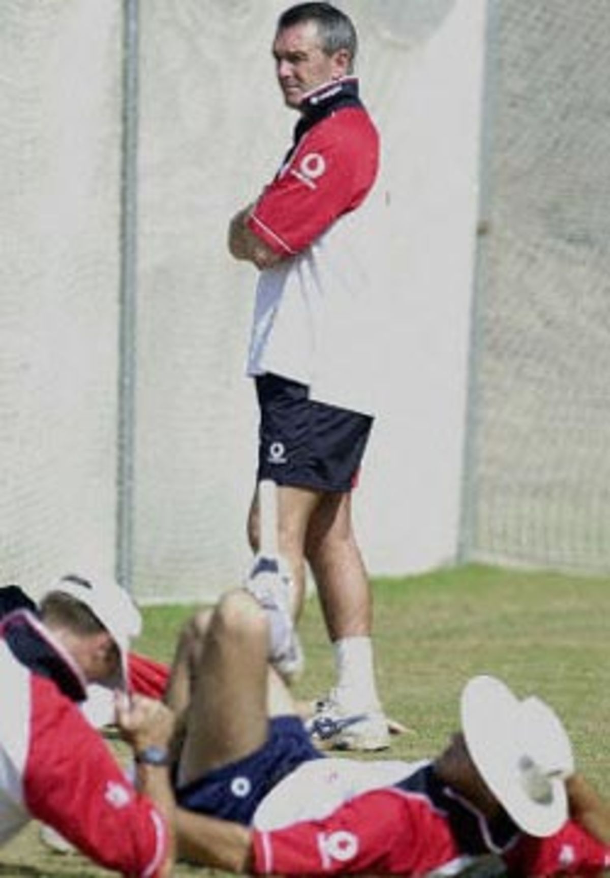 Martyn Ball checks out how hopeful stumper Warren Hegg gathers the ball ...