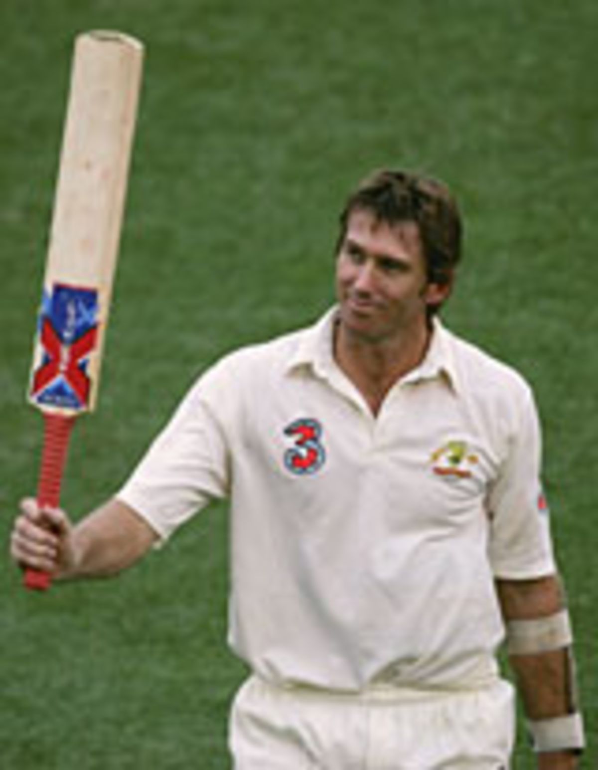 Glenn McGrath raises his bat | ESPNcricinfo.com