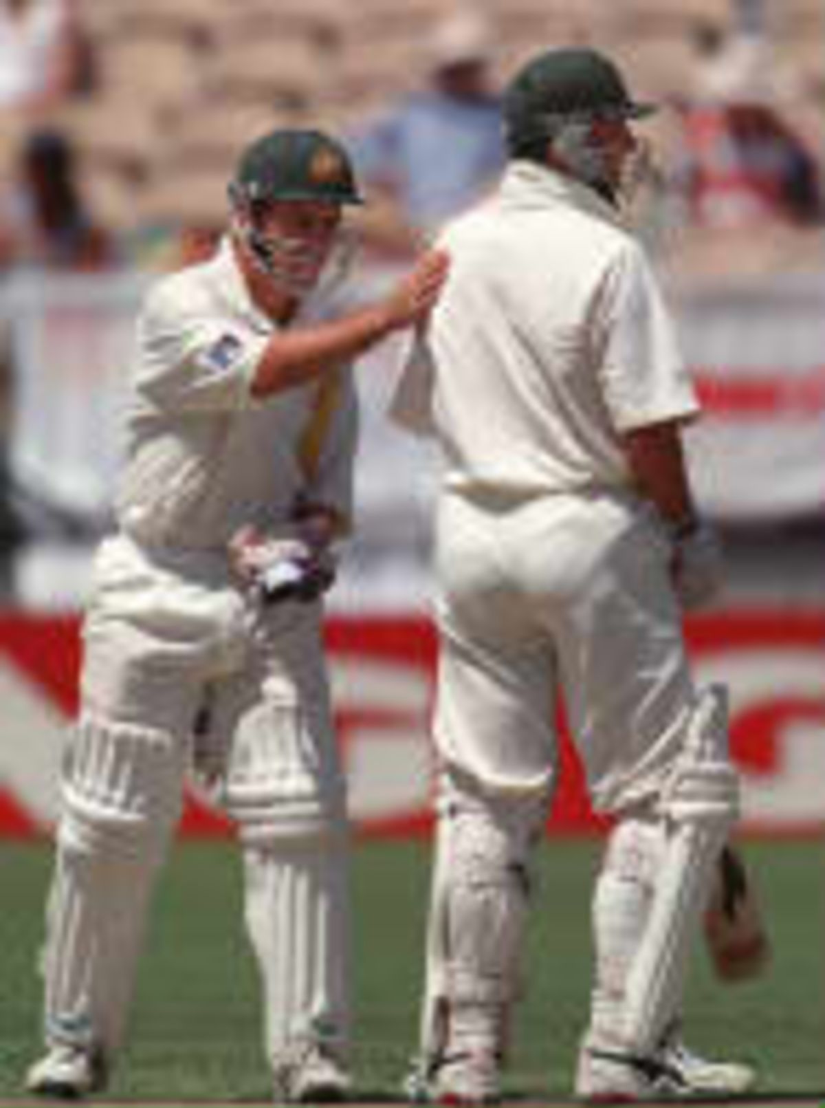 Pat Symcox checks where the ball went | ESPNcricinfo.com