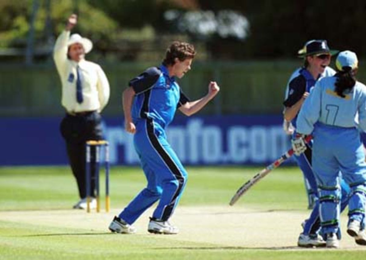The England team celebrate the fall of an Indian wicket | ESPNcricinfo.com