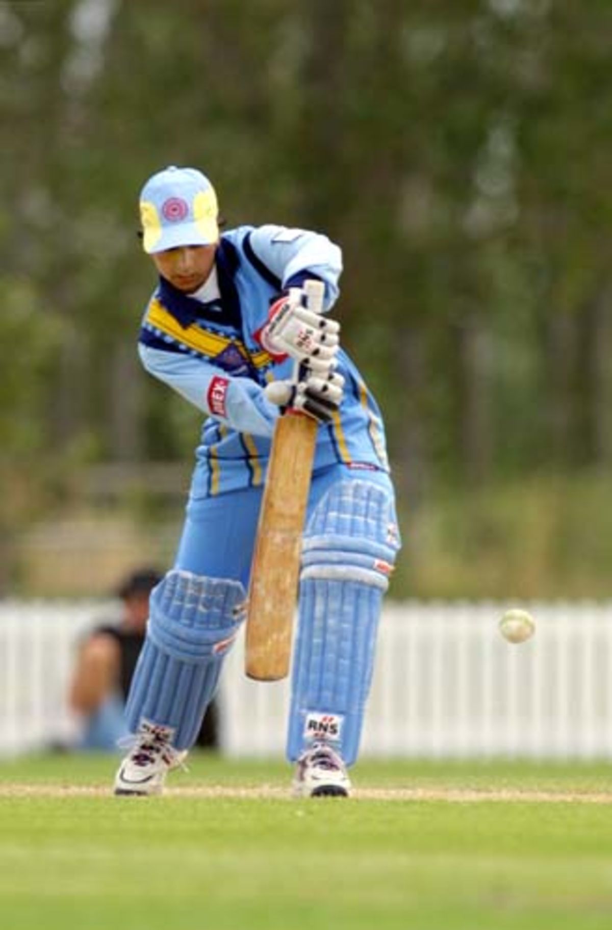 Indian batter Deepa Kulkarni slides along the ground but fails to cross ...