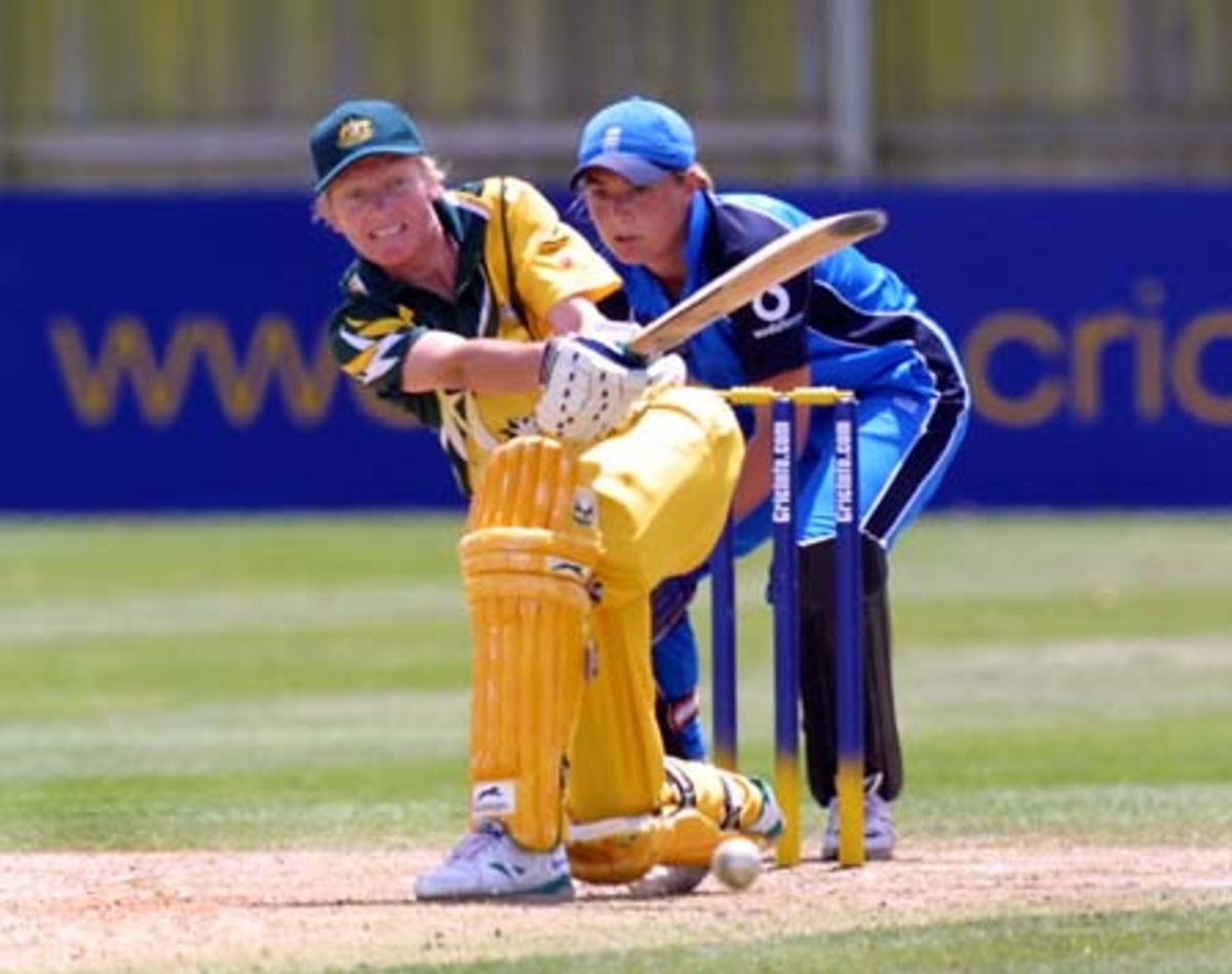 Australian cathryn Fitzpatrick slides the bat across the line to manage ...