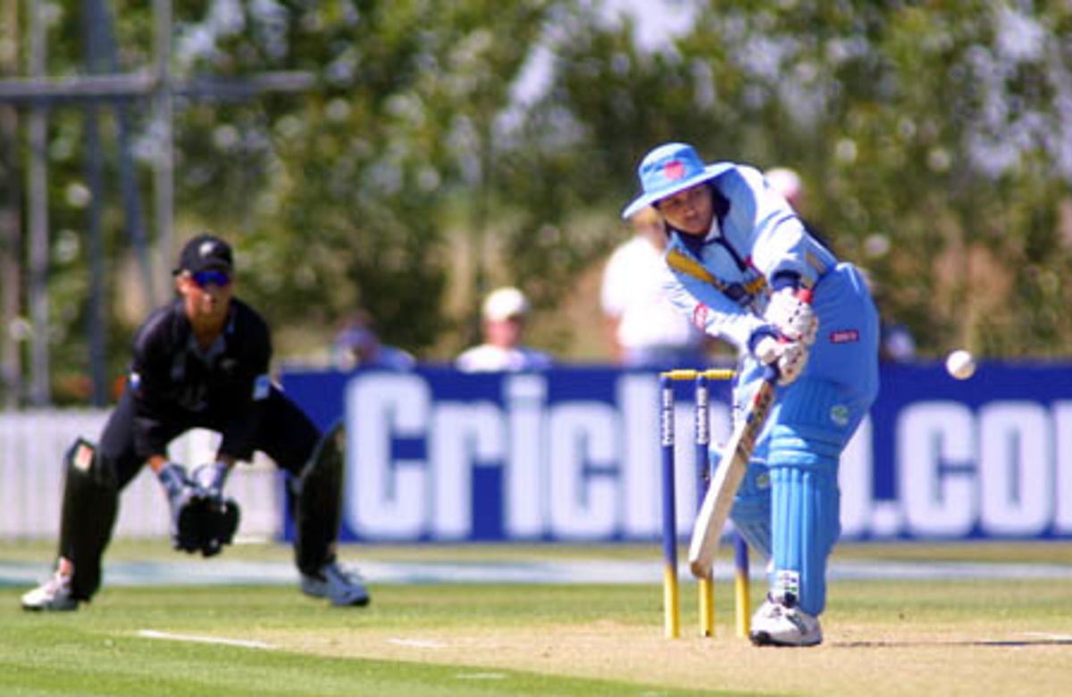 Anju Jain stands with Purnima Rao as they wait for the 3rd umpires ...