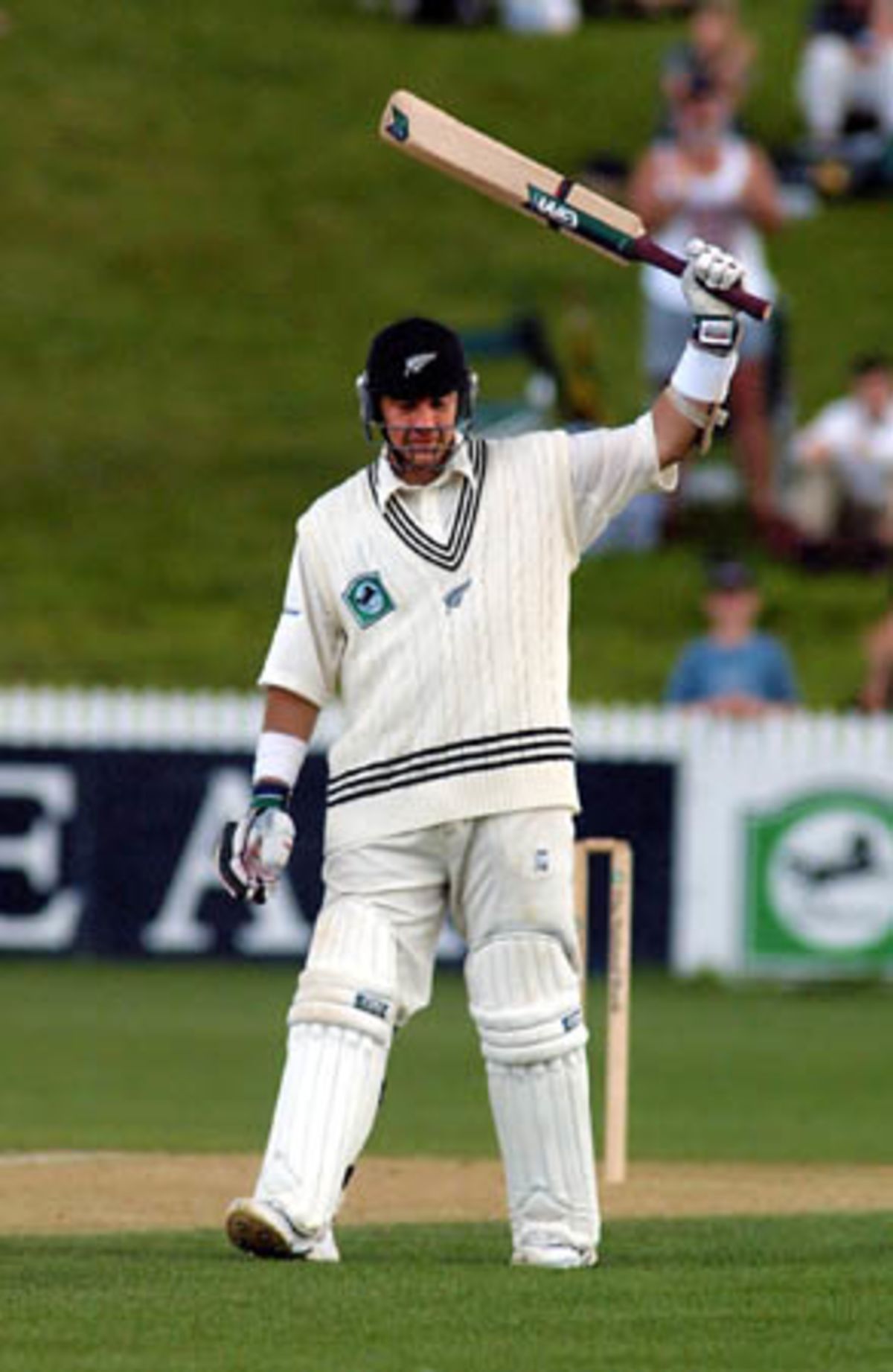 McMillan advances down the pitch to drive a delivery from Ashraful. 1st ...