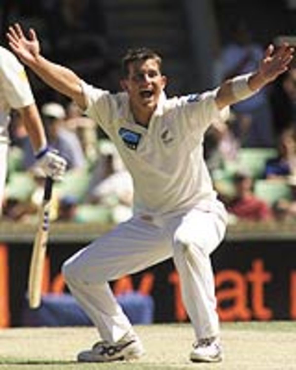 Shane Bond of New Zealand unsuccessfully appeals for LBW against Shane ...