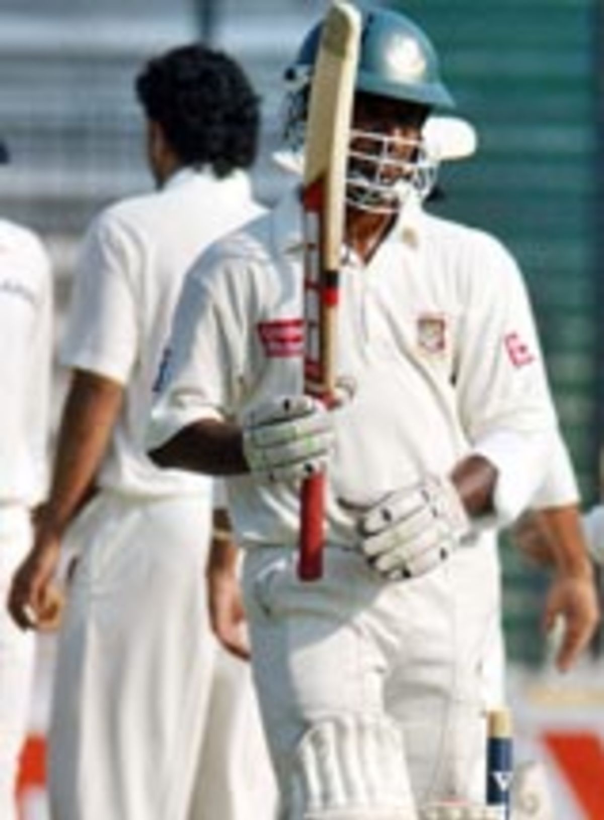 Tapash Baisya walking off after his dismissal | ESPNcricinfo.com