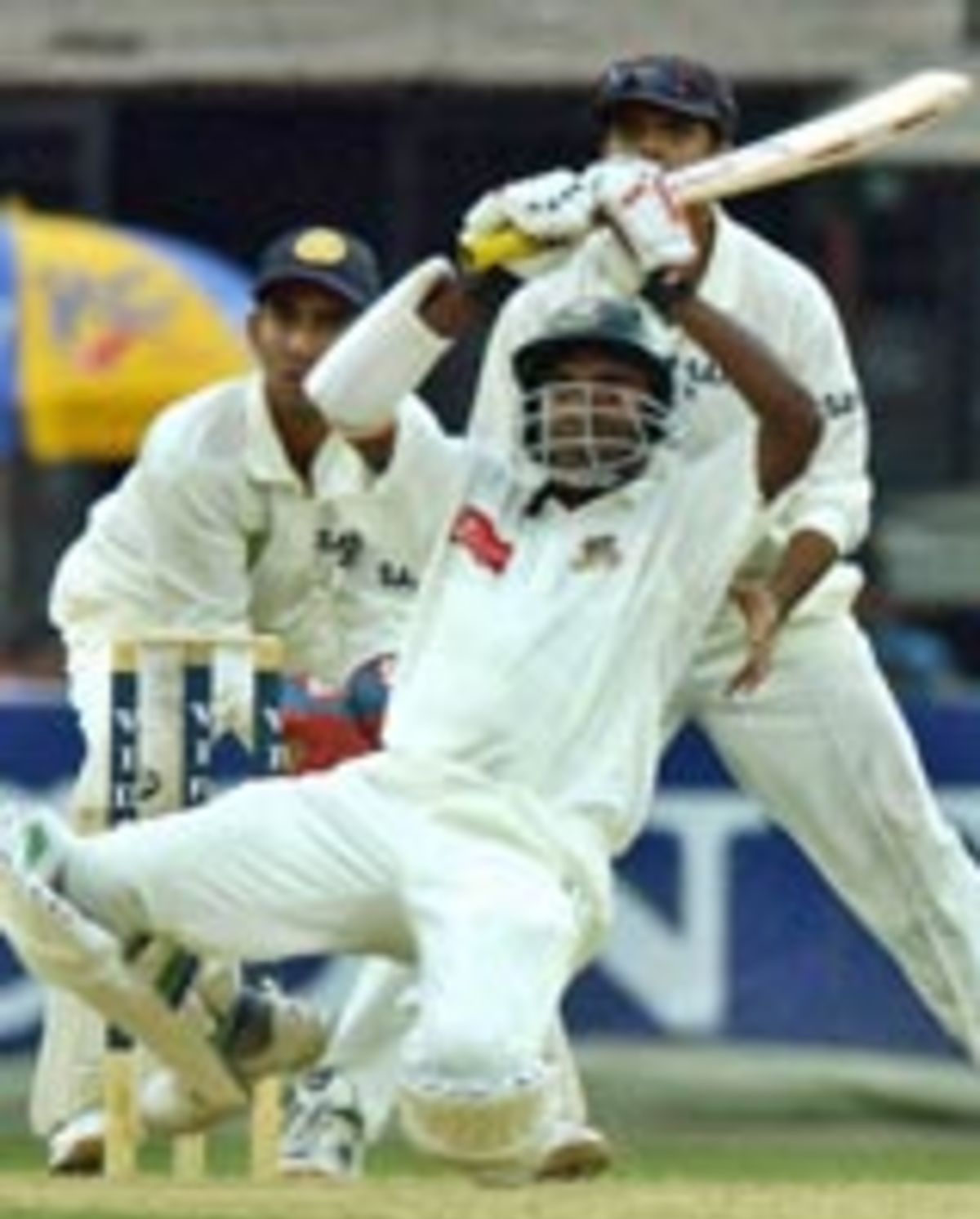 Manjural Islam Rana plays a peculiar stroke on bended knees ...