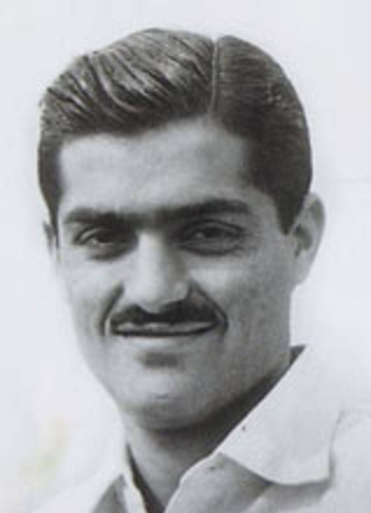 Nari Contractor clutches his head after being struck by Charlie ...