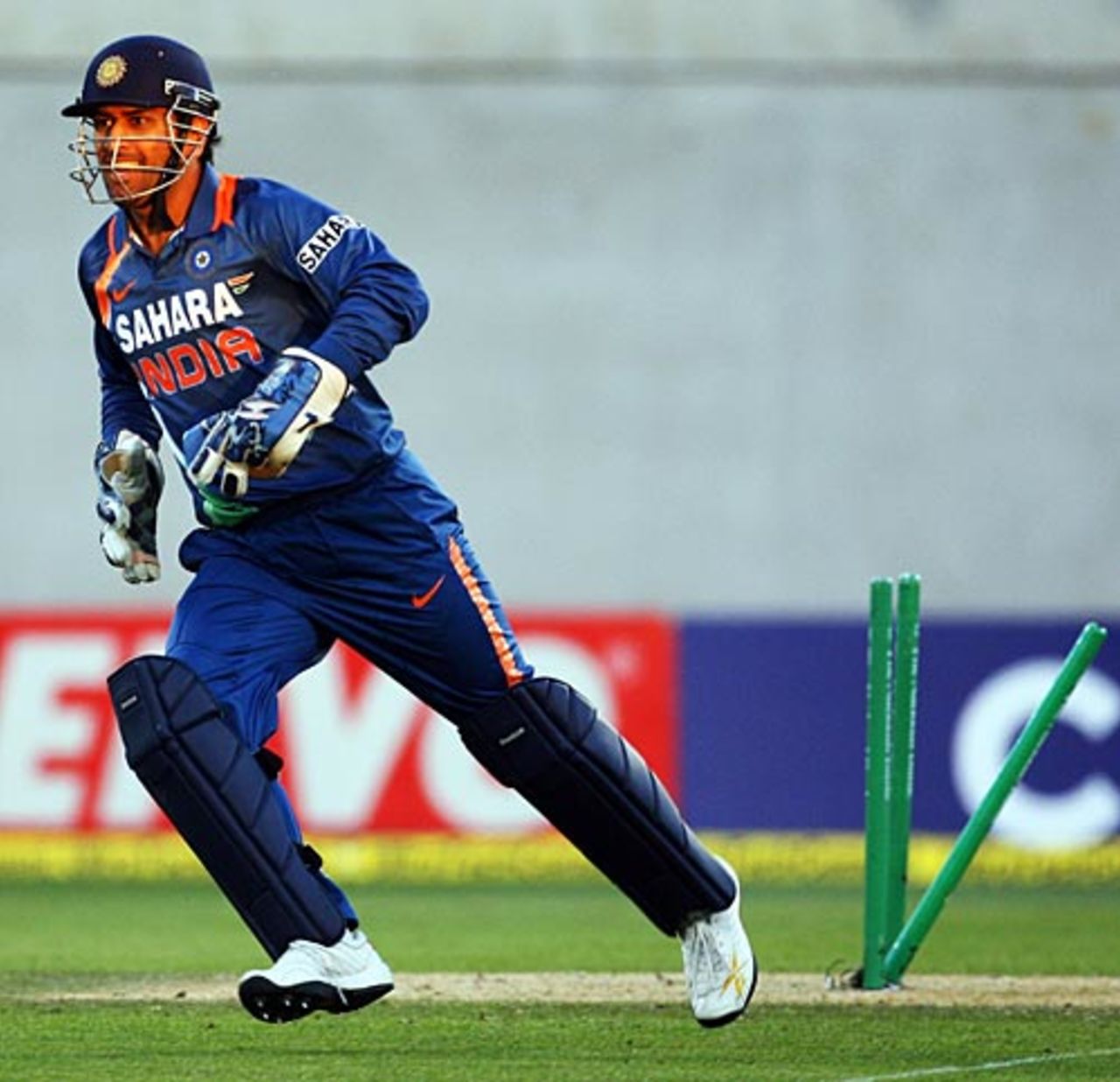 Mahendra Singh Dhoni celebrates a run out | ESPNcricinfo.com