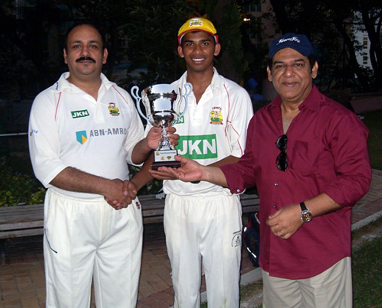 LSW St George's winning captain Nadeem Ahmed receives the Tony Turner ...