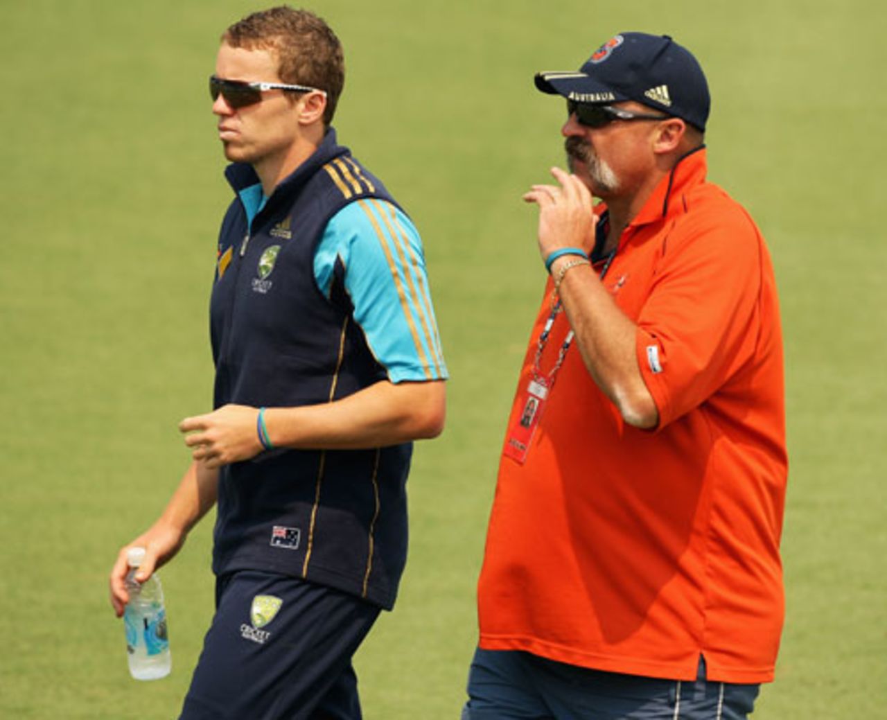 Peter Siddle talks to the selector Merv Hughes before pulling out of ...
