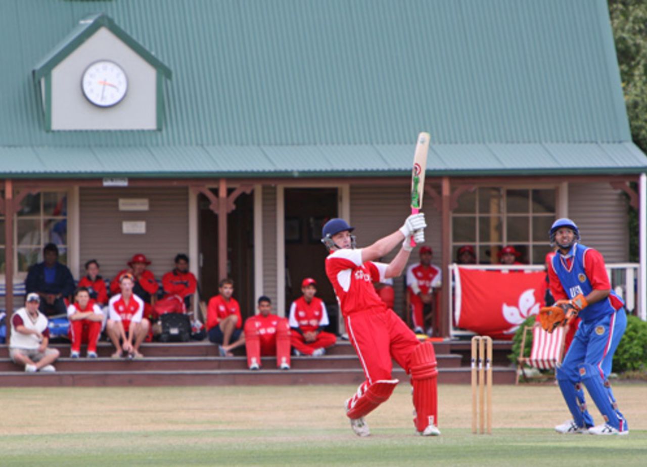 James Atkinson pulls the ball to the boundary during his 100 against ...