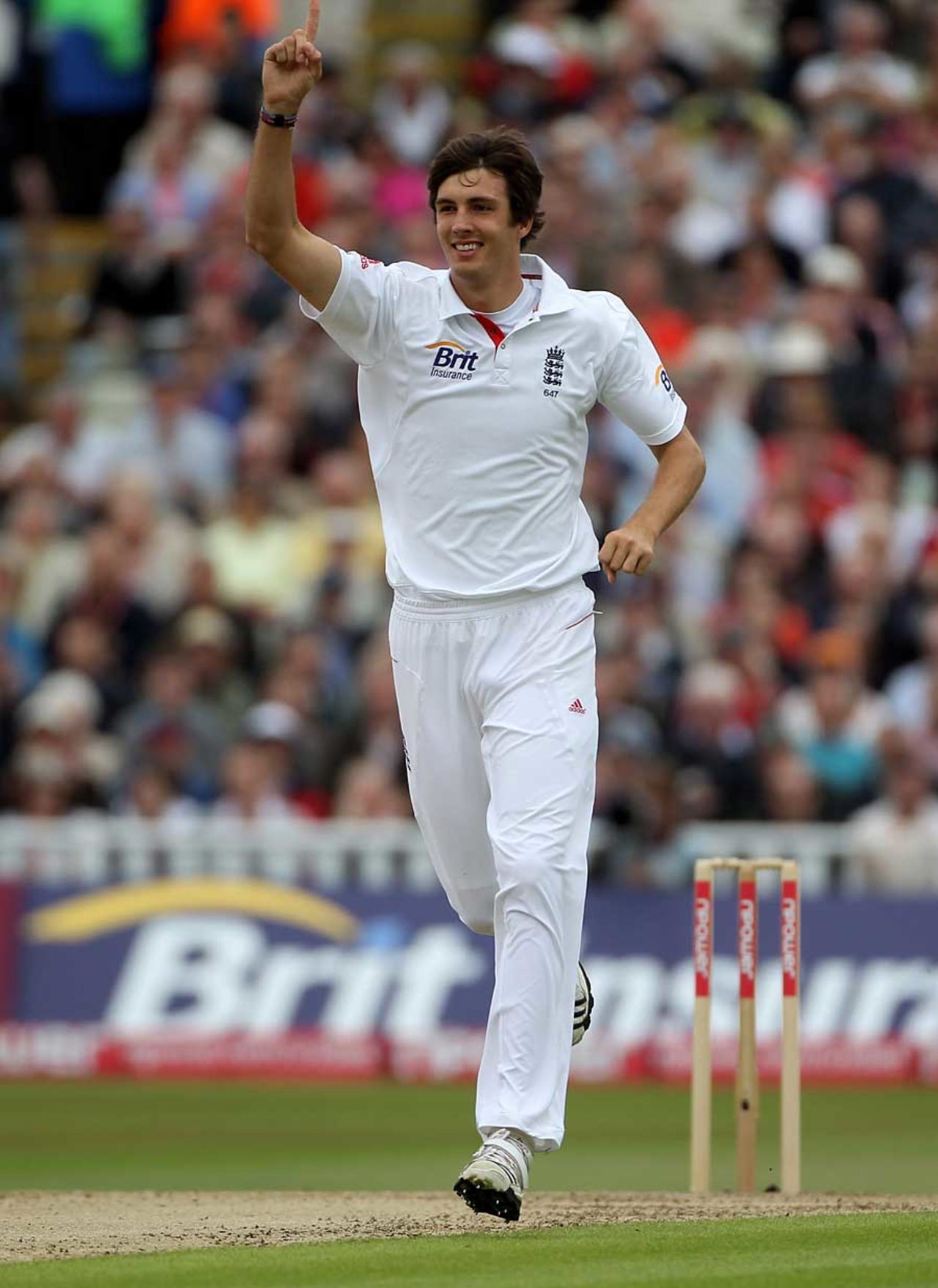 Steven Finn takes the congratulations after his success | ESPNcricinfo.com