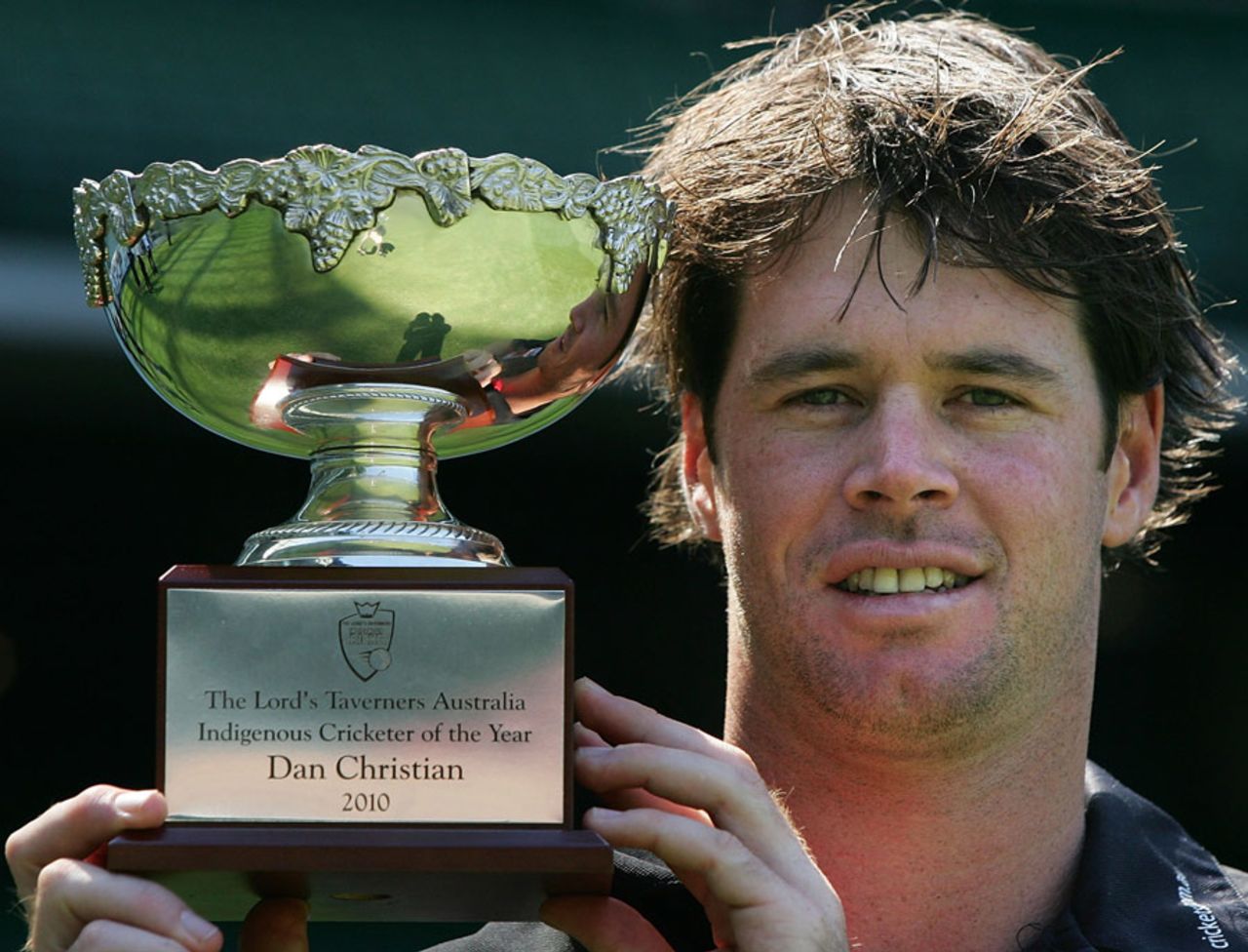 Dan Christian poses with the Indigenous cricketer of the year trophy ...