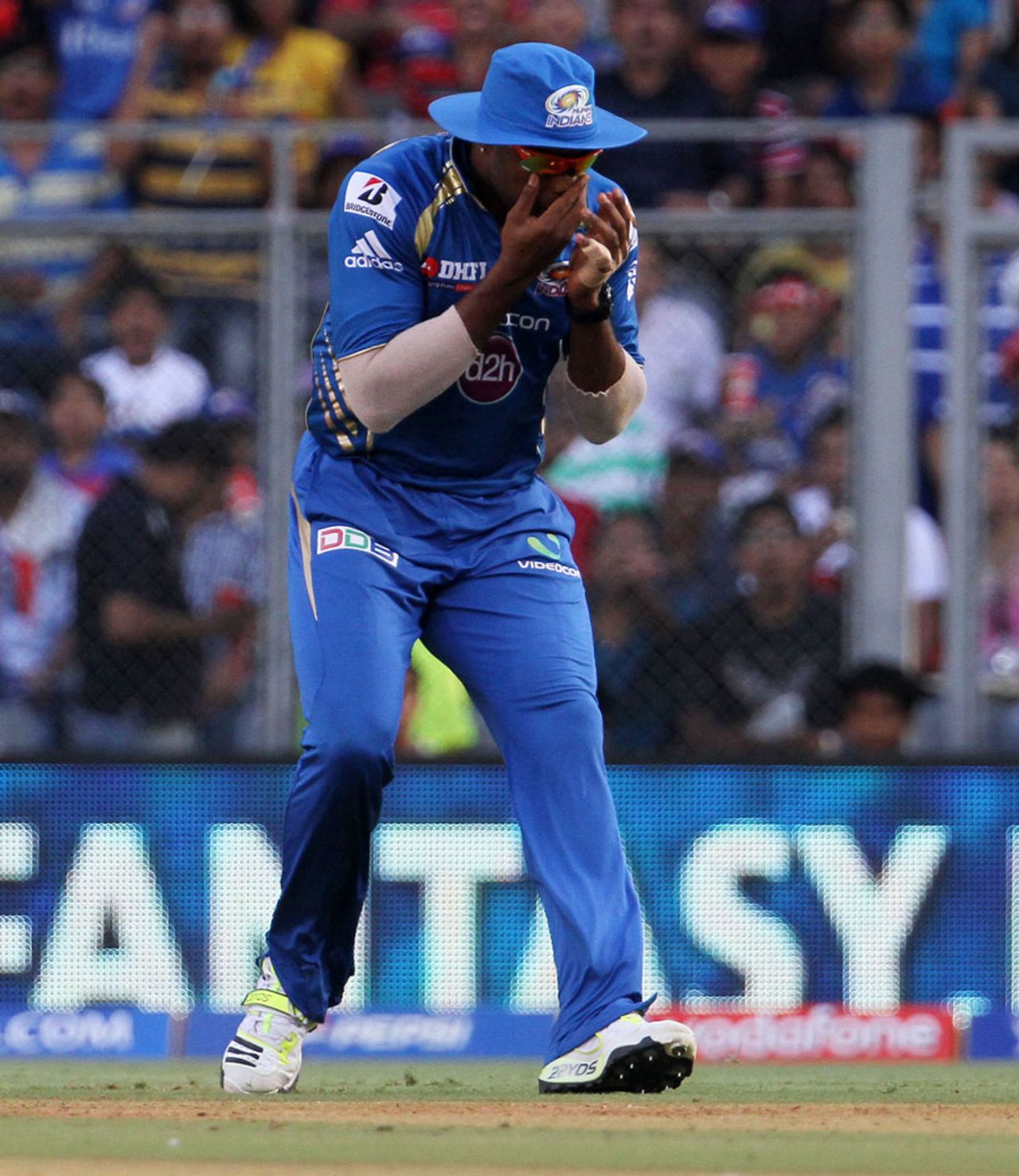 Kieron Pollard tends to his nose after an attempted catch ricocheted on ...