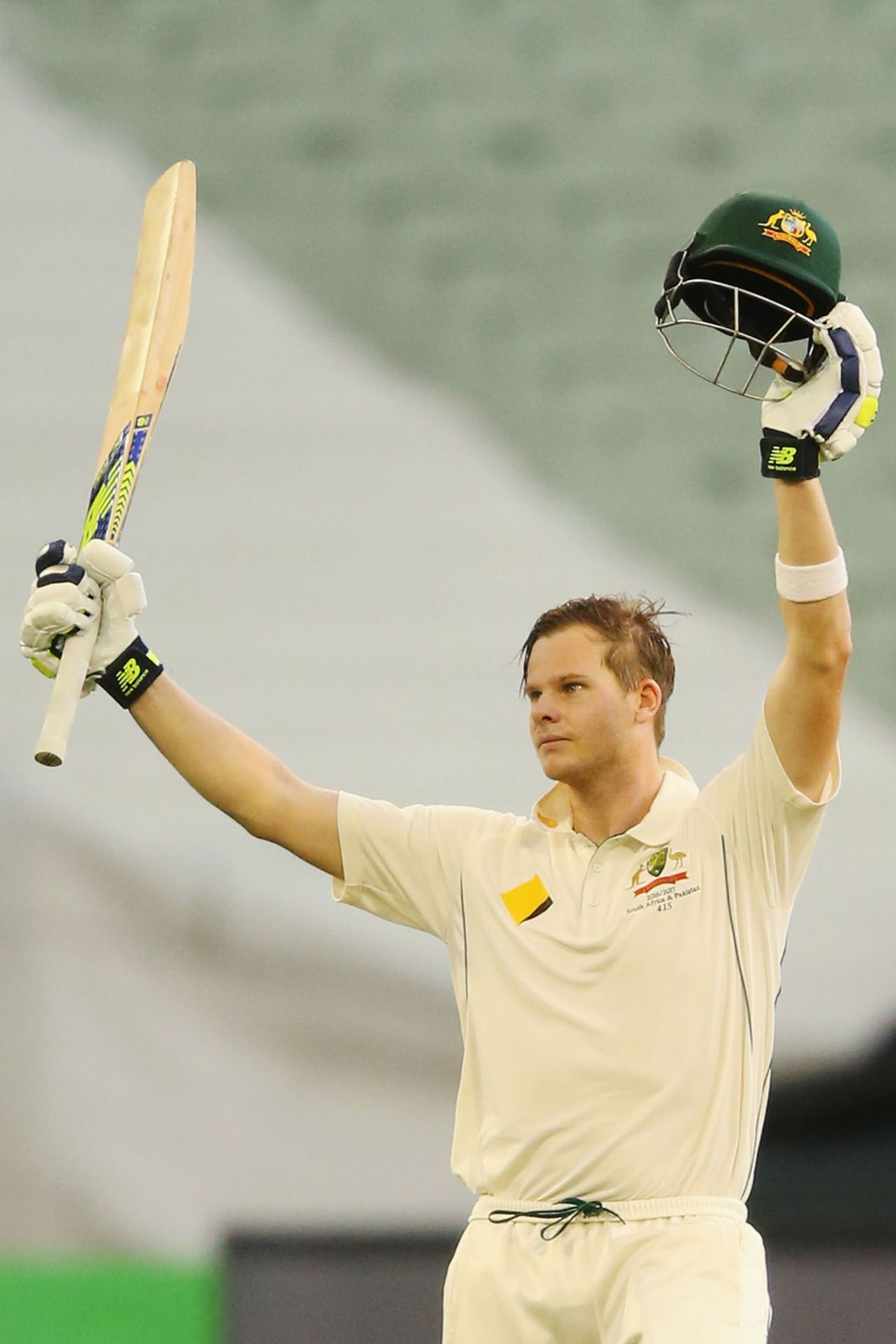 Steven Smith raises his bat after reaching his century | ESPNcricinfo.com