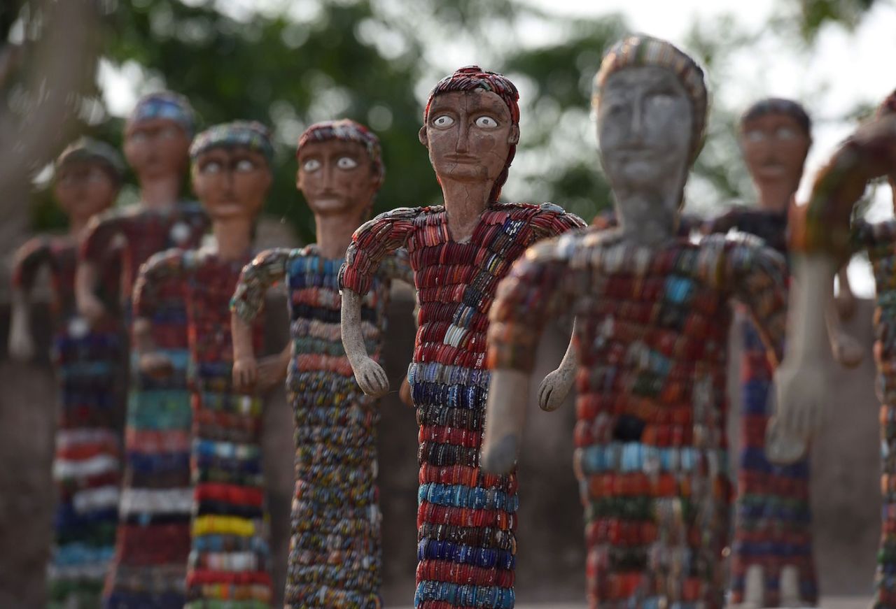 Broken-bangle-clad statues stand guard at the Rock Garden ...