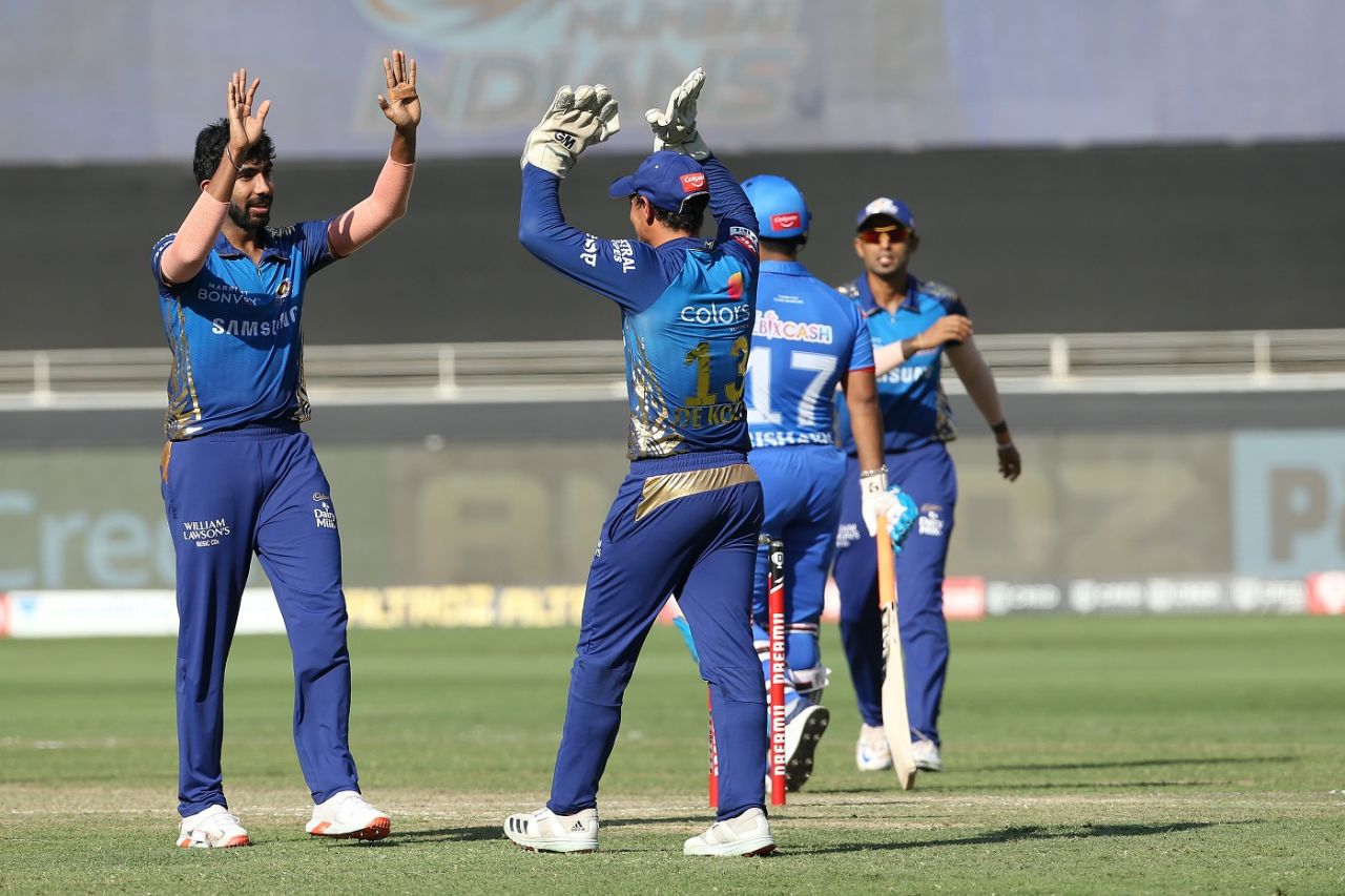 Rohit Sharma and Zaheer Khan share a light moment as Jasprit Bumrah looks on | ESPNcricinfo.com