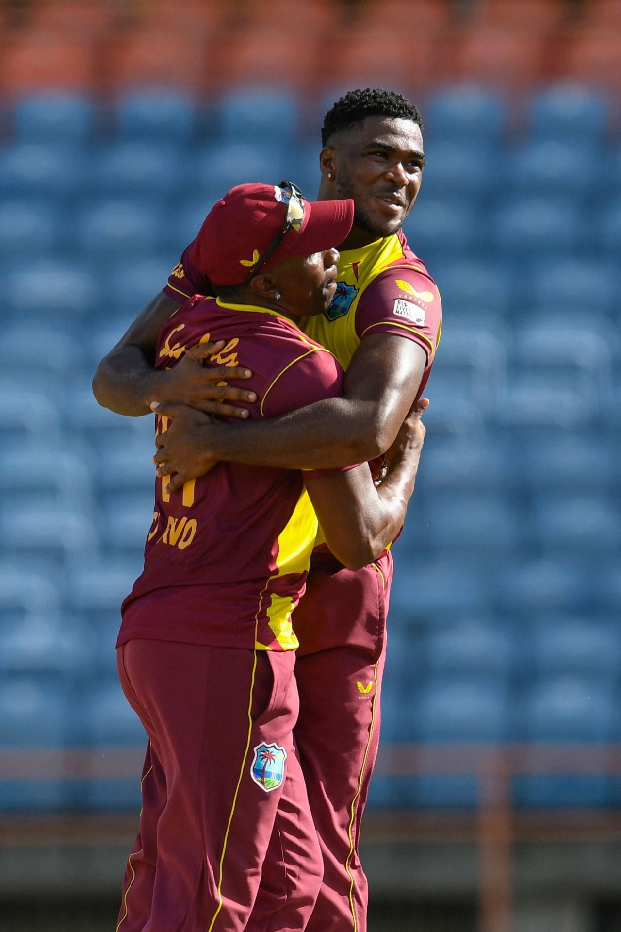 Obed McCoy and Dwayne Bravo get together as Heinrich Klaasen walks back ...