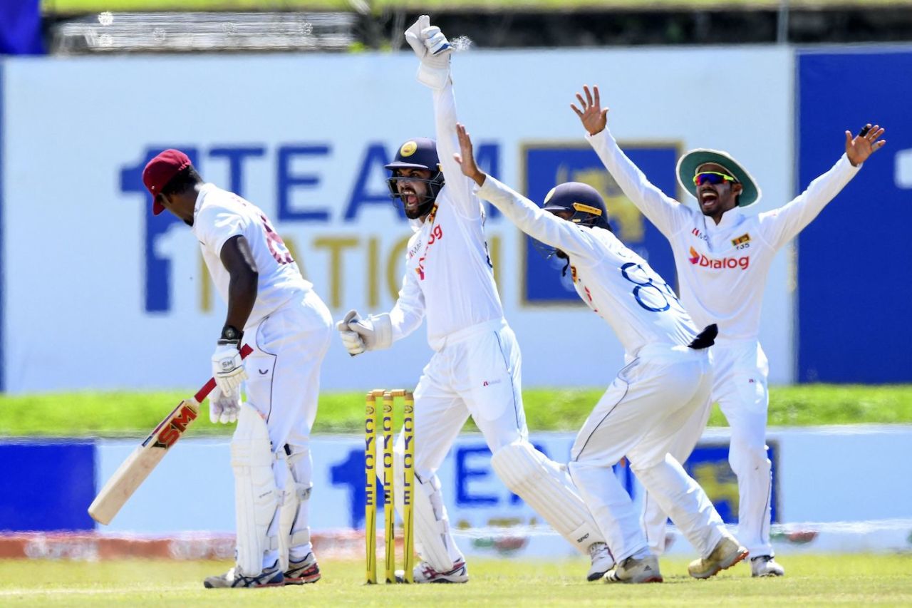 Lasith Embuldeniya celebrates the wicket of Kraigg Brathwaite with his ...
