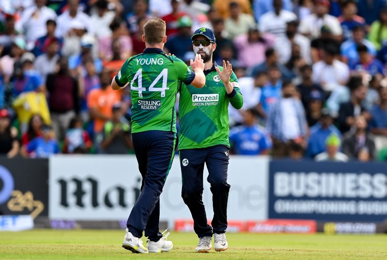 Craig Young celebrates with Andy Balbirnie after striking in his first ...