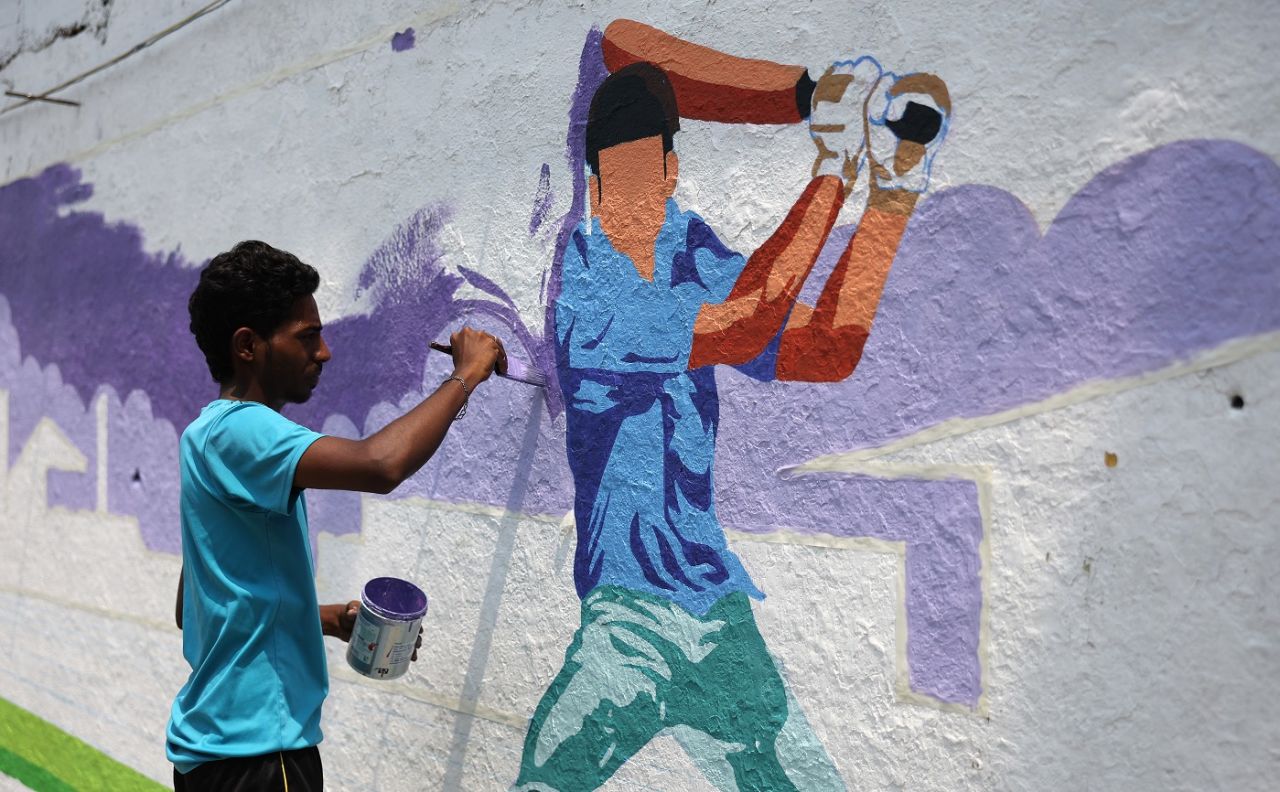 An artist from Chennai paints a mural in the build-up to the city's ...