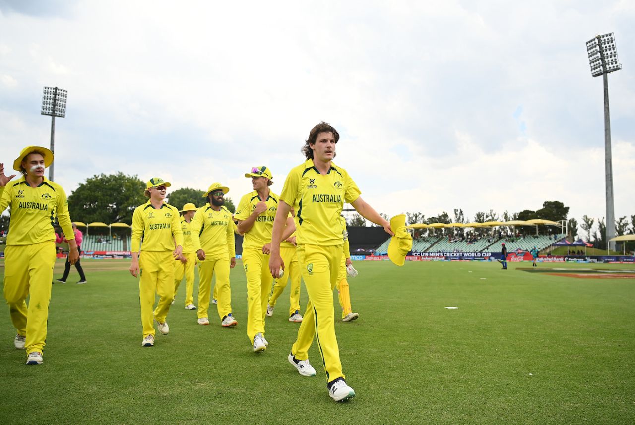 Tom Straker leads the Australians off the field | ESPNcricinfo.com