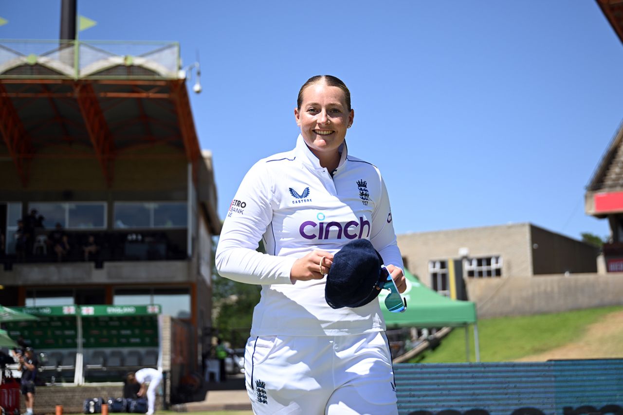 Sophie Ecclestone grins as she walks onto the pitch | ESPNcricinfo.com