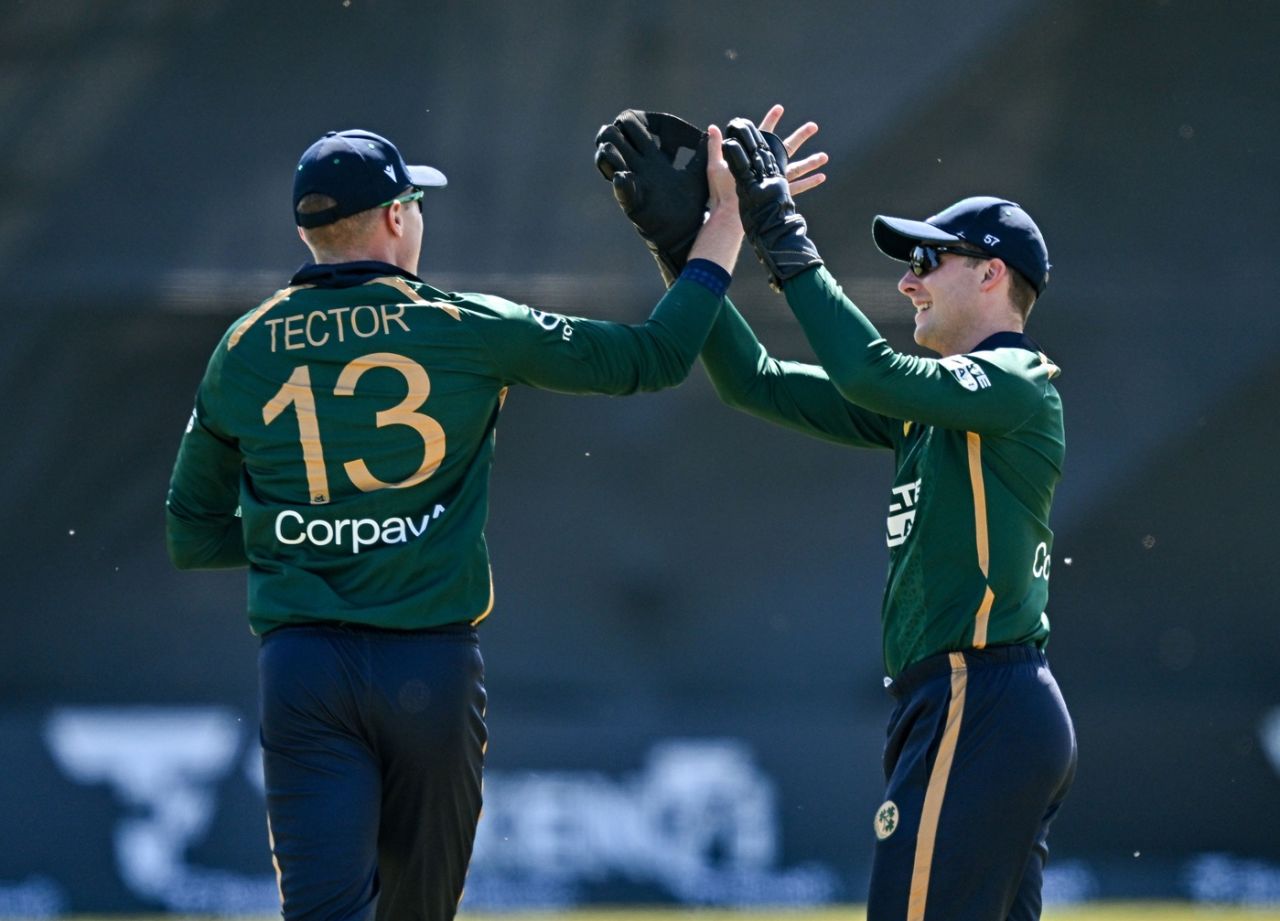 Harry Tector celebrates with Lorcan Tucker after running out Evin Lewis ...