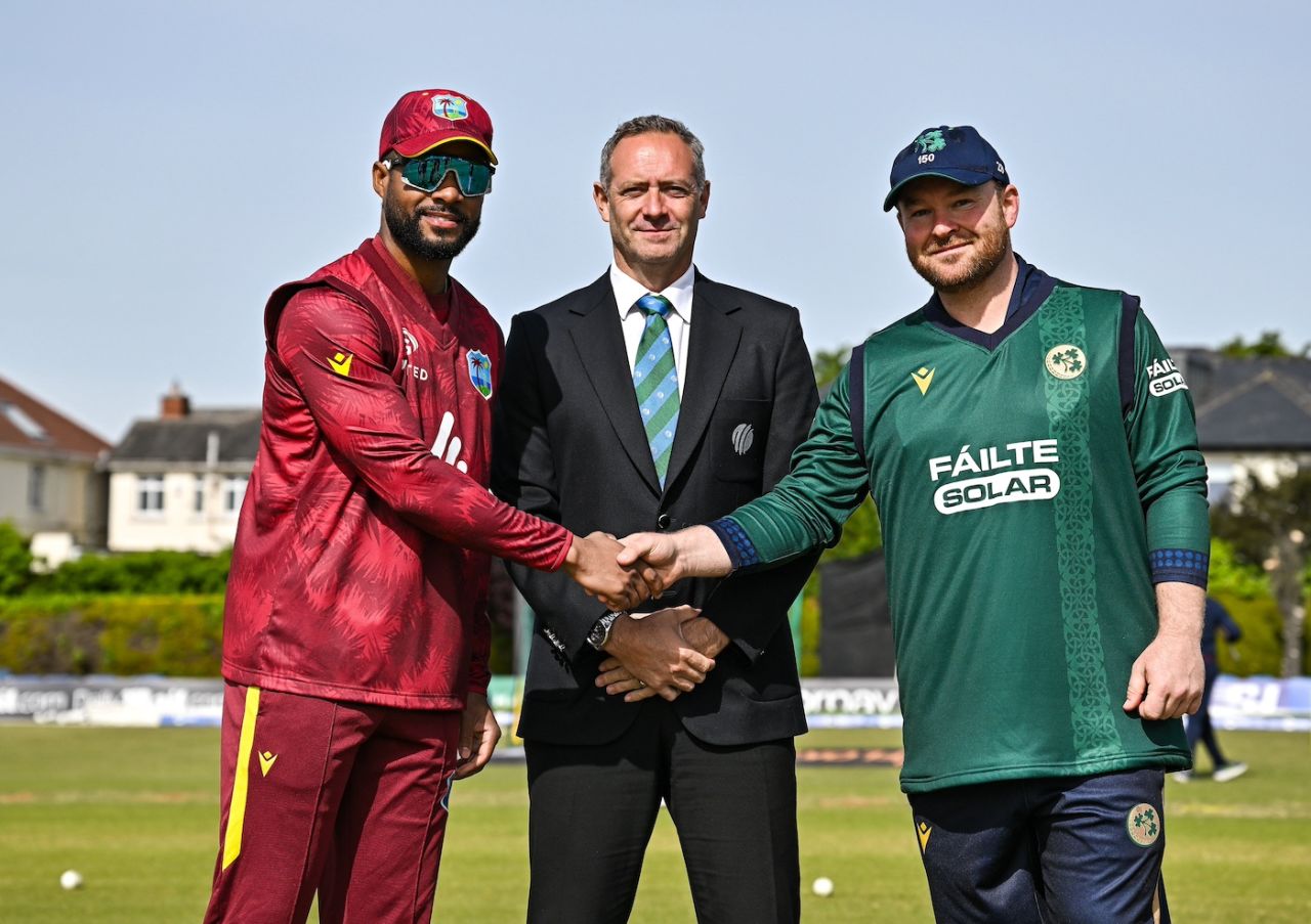 Shai Hope and Paul Stirling greet each other as match referee Dean ...