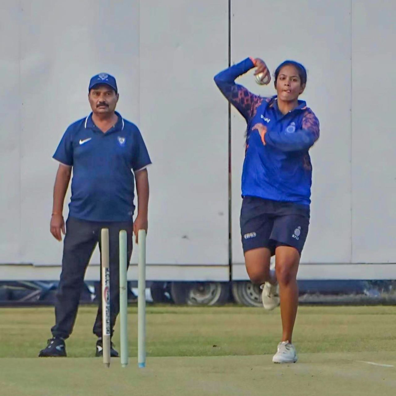 Salonee Dangore bowls under the watchful eye of Narendra Hirwani ...