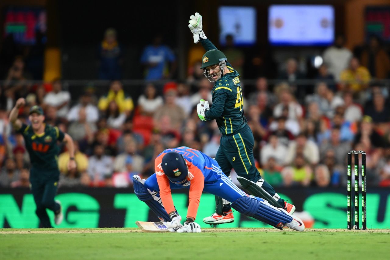Josh Inglis claims a catch off Tilak Varma | ESPNcricinfo.com