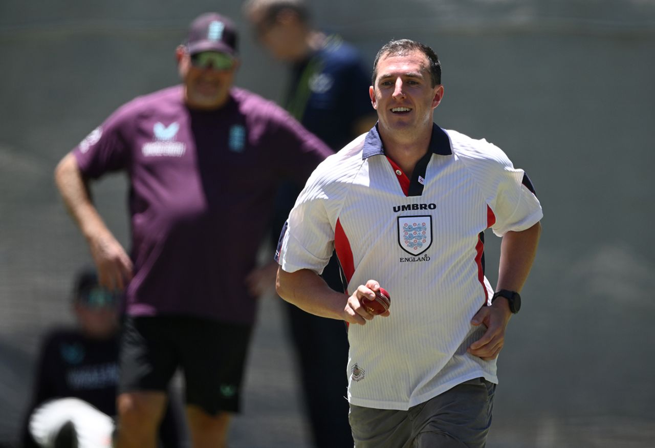 Dan Worrall bowled at England training wearing an England football ...