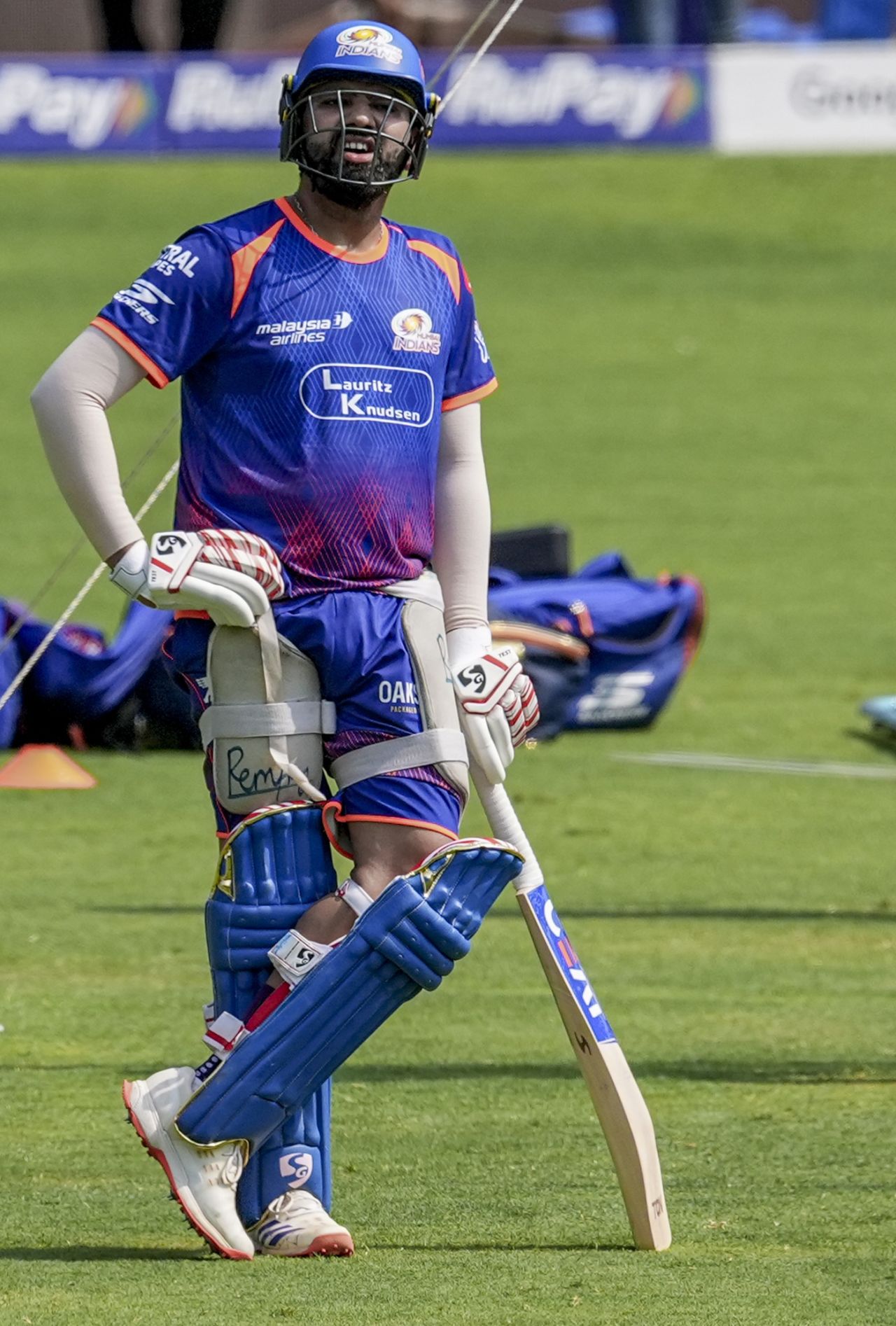 Rohit Sharma with MI bowling coach Paras Mhambrey at a training session ...