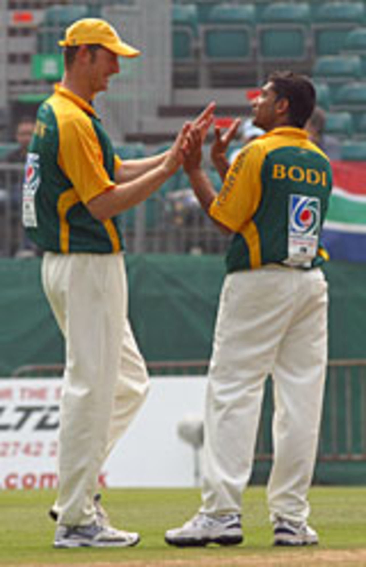 Gerald Dros and Goolam Bodi celebrate a wicket. | ESPNcricinfo.com