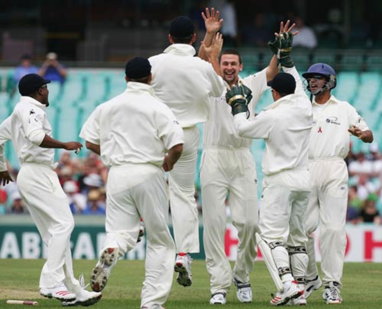 The World XI celebrate the early fall of Justin Langer | ESPNcricinfo.com