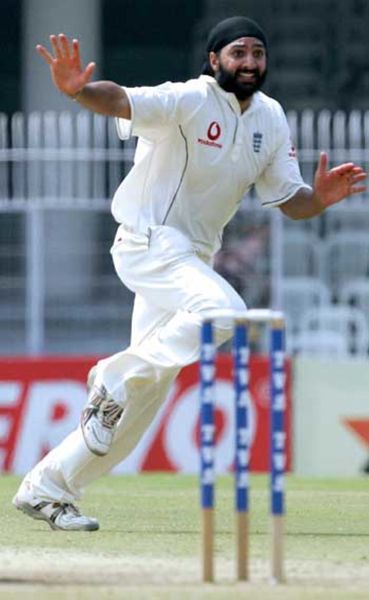 A delighted Monty Panesar celebrates his first Test wicket ...