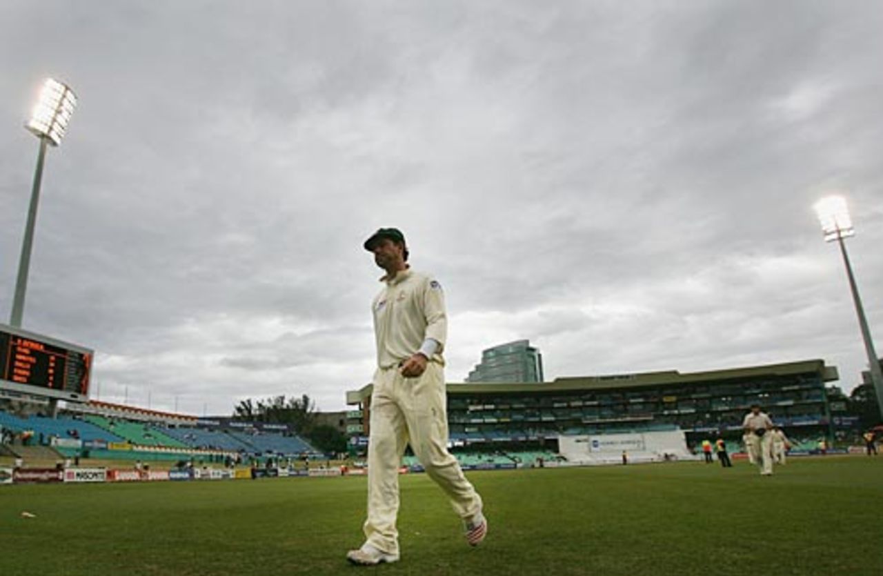 Ricky Ponting leaves the ground as the light fails | ESPNcricinfo.com