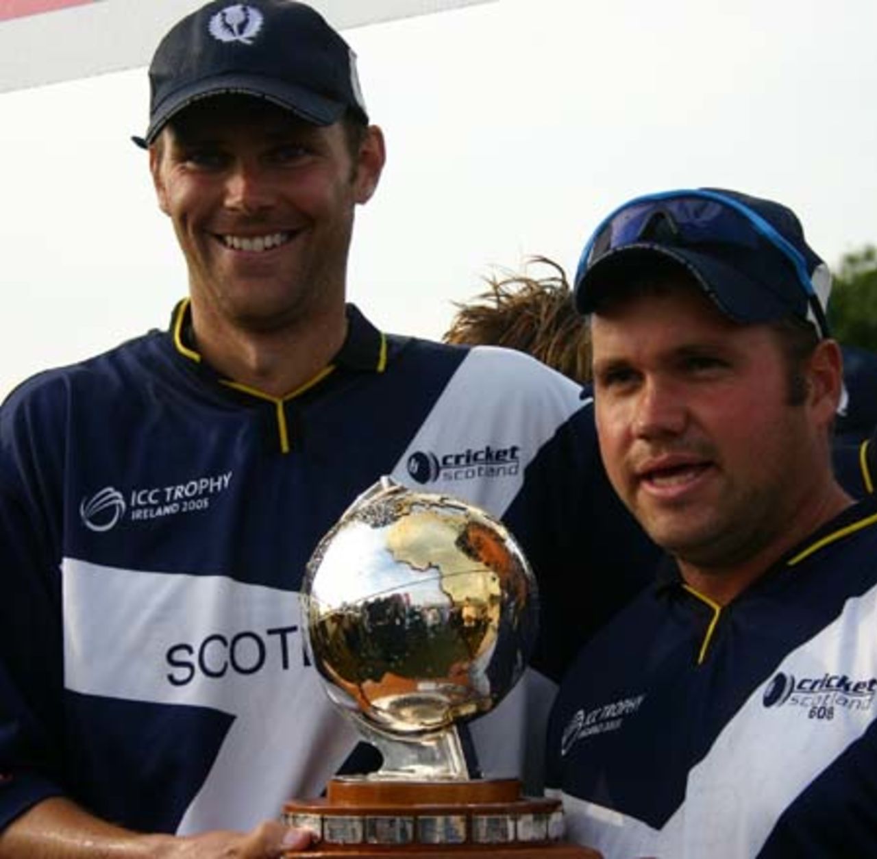 Craig Wright and Fraser Watts celebrate with the trophy | ESPNcricinfo.com