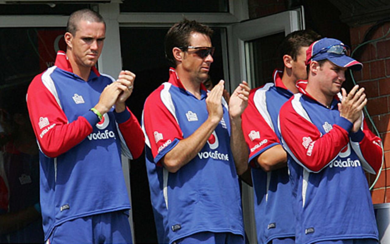 Kevin Pietersen, Marcus Trescothick, Steve Harmison (hidden) and Andrew ...