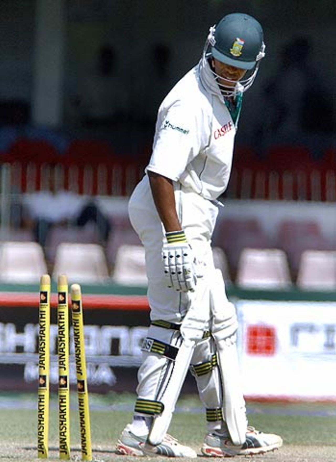 The Sri Lankans troop off after beating South Africa by an innings and ...