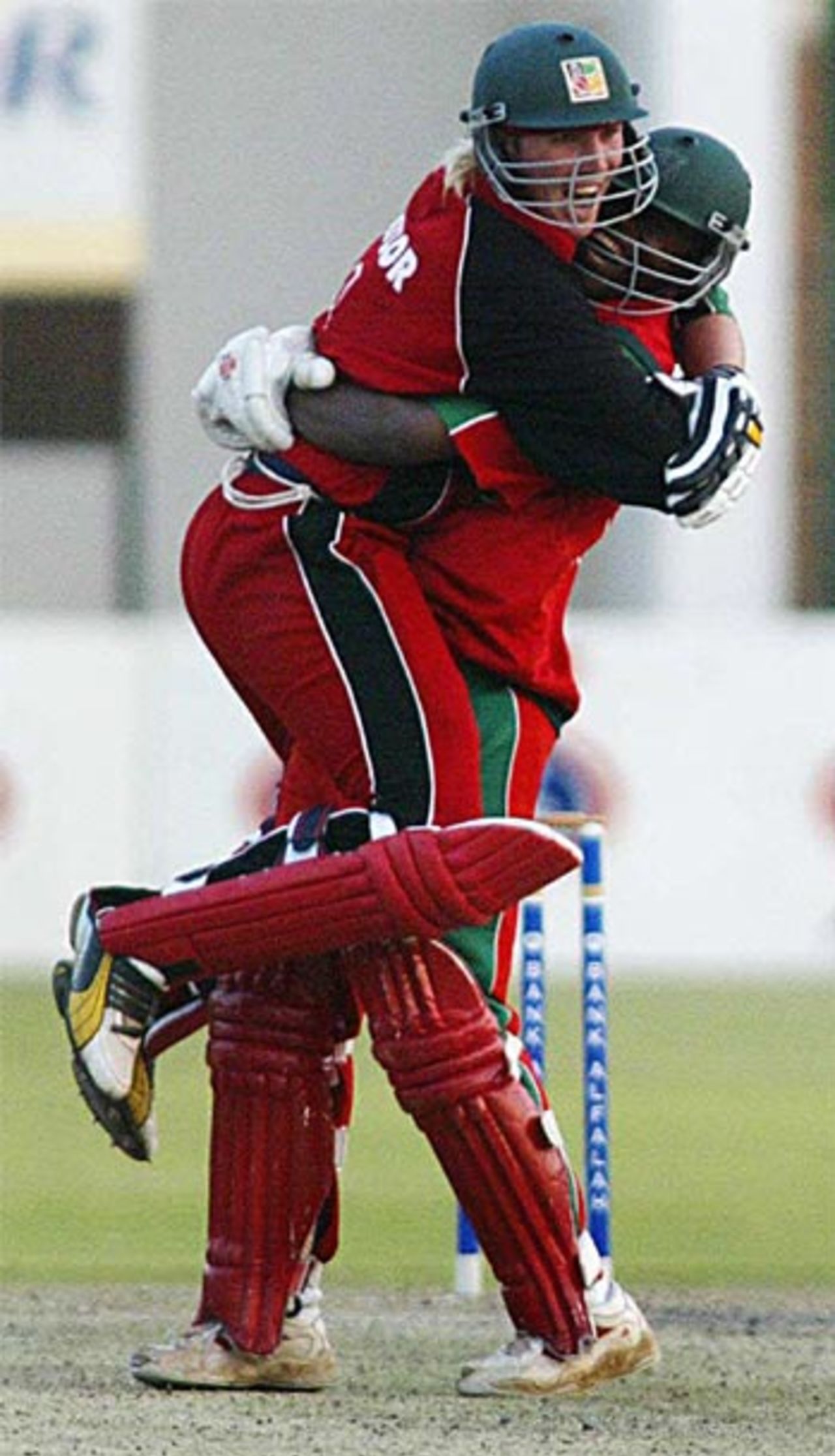 Brendan Taylor and Blessing Mahwire celebrate | ESPNcricinfo.com